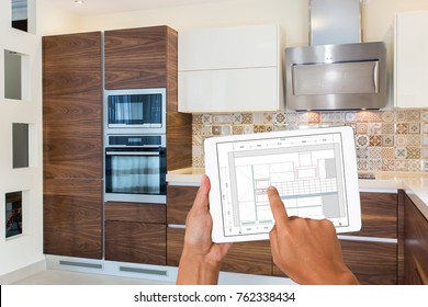 Hands Holding Tablet Showing Kitchen Plans Stock Photo 762338428 ...