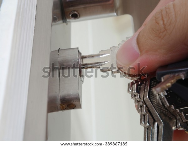 Hands Inserting Keys Door Lock Stock Photo 389867185 | Shutterstock