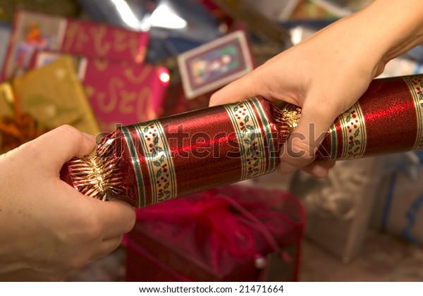 Hands Pulling Christmas Cracker Stock Photo (Edit Now) 21471664