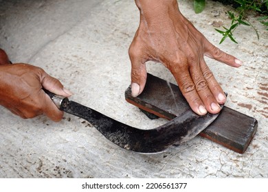 Hands Sharpening Sickle Using Whetstone Stock Photo 2206561377 ...
