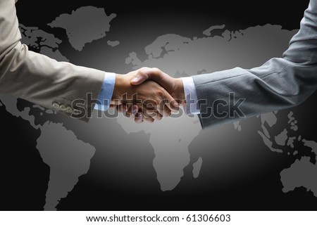 Handshake with Map of the World in Background Image - cg6p1306603s