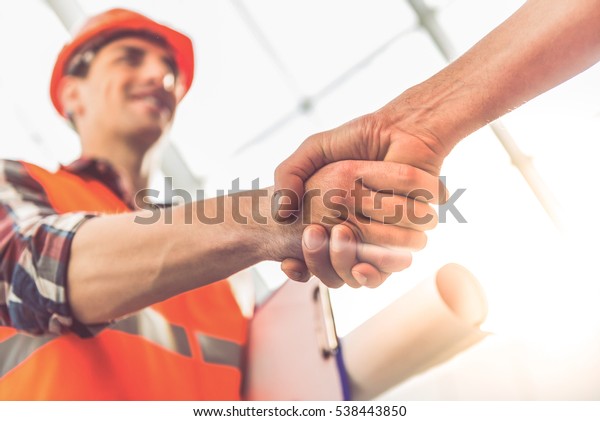 Handsome Construction Workers Protective Helmets Vests Stock Photo ...