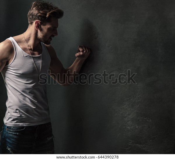 Handsome Guy On Studio Background Stock Photo (Edit Now) 644390278