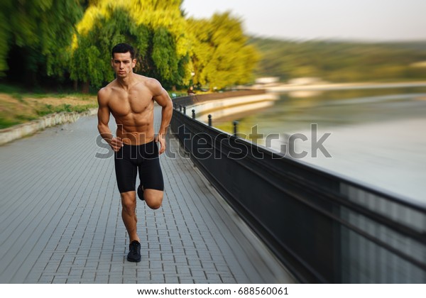 Handsome Sexy Male Athlete Young Man With Naked Torso Morning Run In