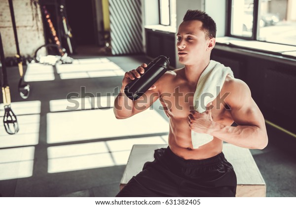 Handsome Young Muscular Sportsman Drinking Water Stock Photo (Edit Now ... Handsome Young Muscular Sportsman Drinking Water Stock Photo (Edit Now ...