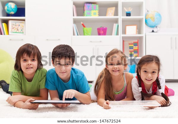 Happy Kids Using Tablet Computers Stock Photo 147672524 | Shutterstock