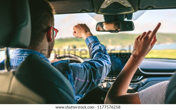Happy Young Man Dancing While Driving Stock Photo (Edit Now) 1177576258