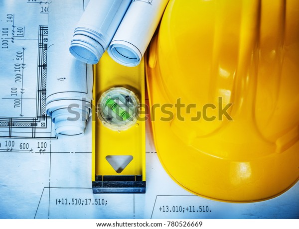 Hard Hat Construction Level Drawings On Foto de stock 780526669 ...