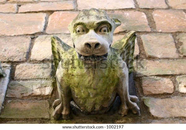Hideous Gargoyle Stares Down Old Roof Stock Photo 1002197 | Shutterstock