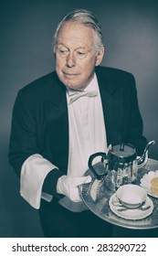 200 Butler serving tea Stock Photos, Images & Photography | Shutterstock