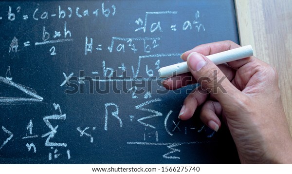 Holding Chalk Write Mathematical Formulas On Stok Fotoğrafı 1566275740 ...