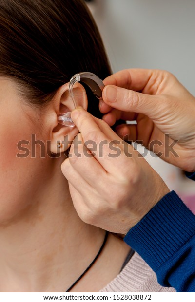 How Insert Hearing Aid Into Ear Stock Photo (Edit Now) 1528038872