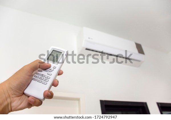 Human Hand Using White Remote Air Stock Photo (Edit Now) 1724792947