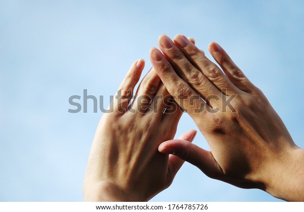 Human Hands Blocking Sunlight Pointing Blue Stock Photo 1764785726 ...