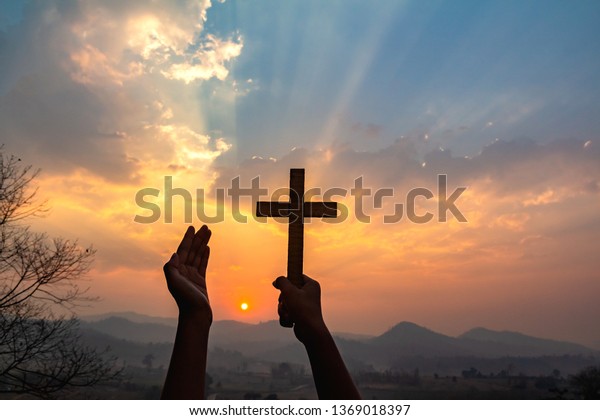 Human Hands Praying God While Holding 库存照片（立即编辑）1369018397