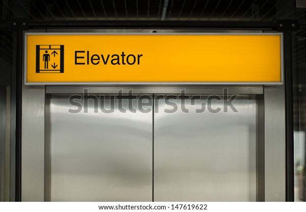 Illuminated Elevator Sign Stock Photo (Edit Now) 147619622