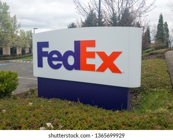 FedEx Home Delivery Logo Vector (.EPS) Free Download
