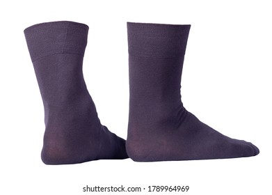 Orang yang berdiri di ujung kaus kaki ungu panjang dan sepatu bermotif ...