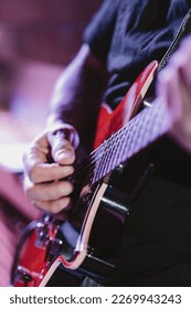 Electric guitar on stage 2K wallpaper download