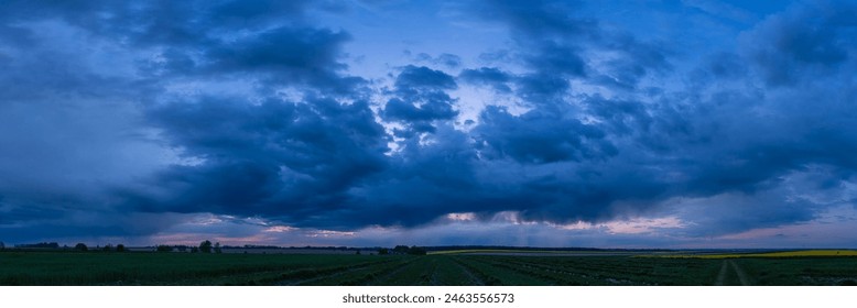 Dramatic Sky Over a Field at Dusk premium 2K wallpaper download