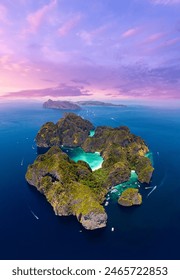 Small island above water with northern lights view 2K wallpaper download