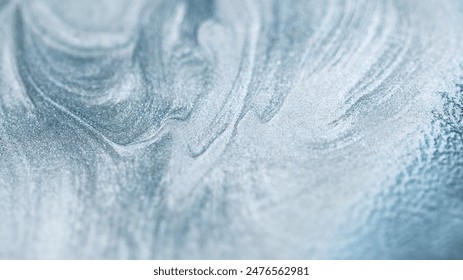 Swirling metallic liquid flow of gold and silver against black premium ...