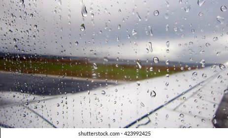 Photograph of airplanes in the airport through the window with ...