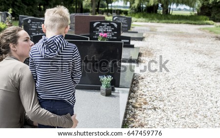 CHILD-IN-THE-CEMETERY Stock Photos and Images - Avopix.com