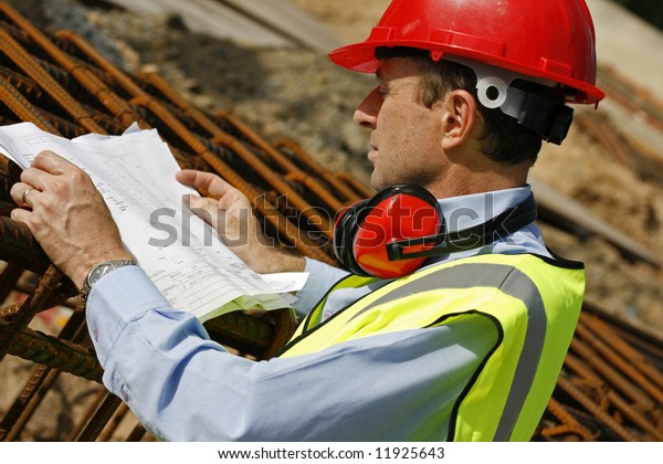 Image Depicting Engineer Reading Plans Construction Stock Photo ...