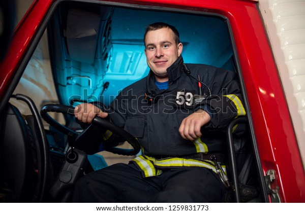 Image Fireman Man Sitting Cab Fire Foto Stok 1259831773 | Shutterstock