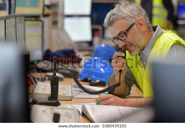 Industrial Control Room Supervisor Using Radio Stock Photo (Edit Now ...