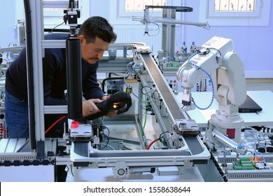Man Programming Robotic Arm Control Panel Stock Photo 1557998045 | Shutterstock