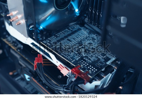 Inside a high performance computer. motherboard and CPU cooling fans ...