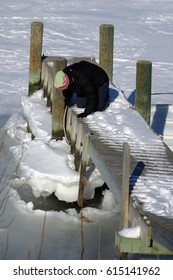 Inspecting Ice Damage Docks Piling Rising Stock Photo (Edit Now) 615141962