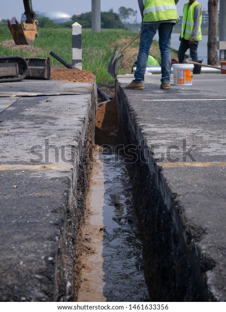 Installing Concrete Drains On Side Road Stock Photo 1461633356 ...