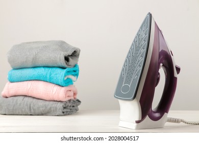 Iron Stack Colored Clothes On White Stock Photo 2028004517 | Shutterstock