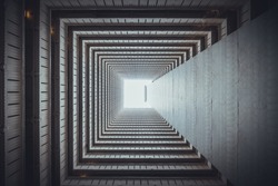 Bottom view of stack building floors featuring building, sky, and light ...