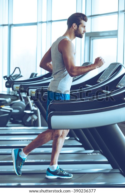 Jogging On Treadmill Side View Full Stock Photo 390236377 | Shutterstock