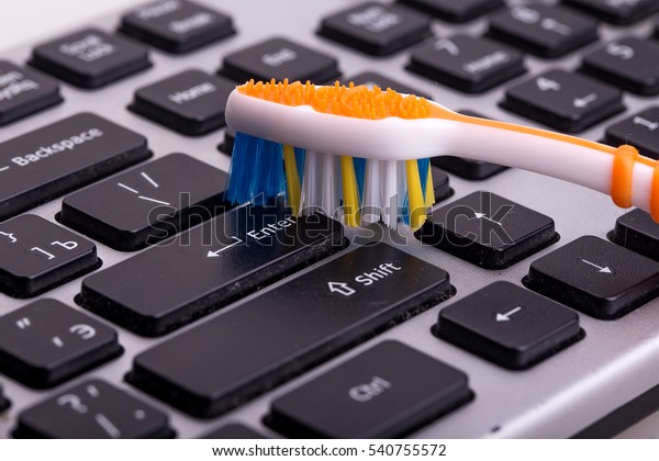 Keyboard Cleaning Stock Photo (Edit Now) 540755572