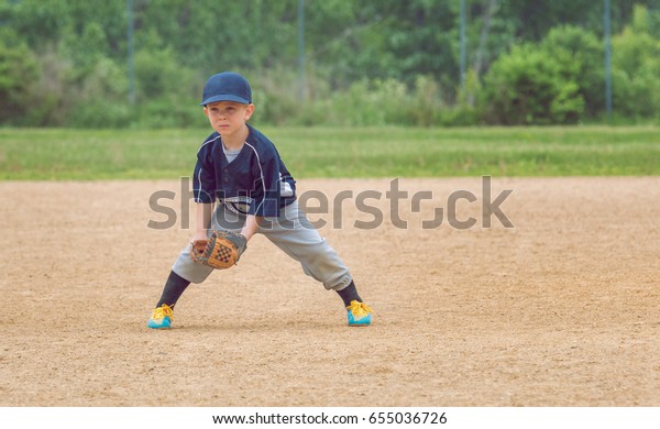 Kid Playing Baseball Stock Photo (Edit Now) 655036726