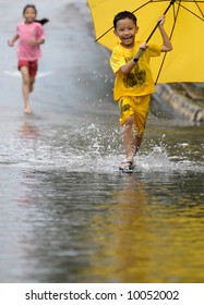 Kids Play While Raining Stock Photo 10052002 | Shutterstock