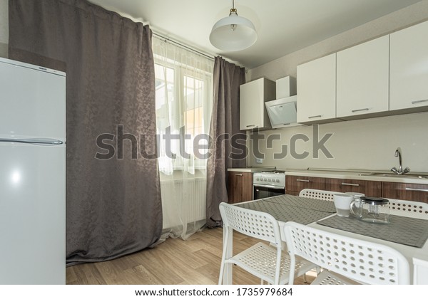 Kitchen Interior Neat Cabinets Dining Table Stock Photo 1735979684 ...