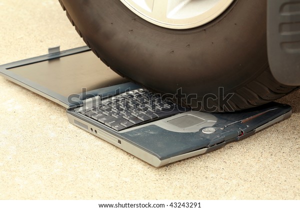 Laptop Computer Driven Over By Car Stock Photo (Edit Now) 43243291