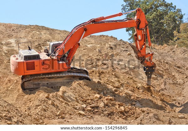 Large Track Hoe Excavator Using Claw Stock Photo (Edit Now) 154296845