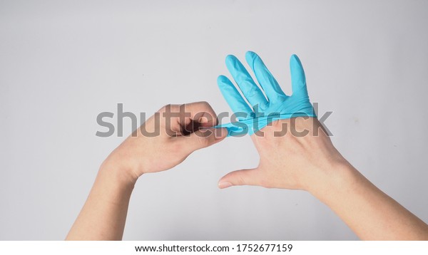 Left Hand Pulling Right Hand Blue Stock Photo 1752677159 | Shutterstock