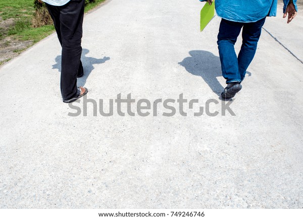 Legs Two Men Walking Together On Stock Photo 749246746 | Shutterstock