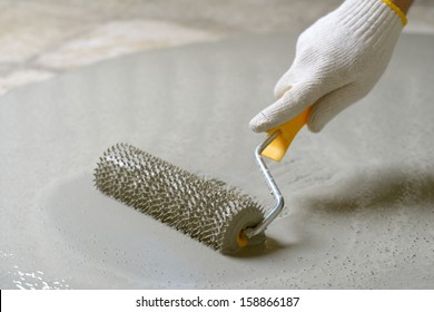 Leveling Floor Using Spiked Roller Stock Photo (Edit Now) 158866187