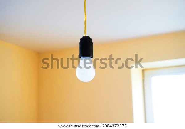 Light Bulb Hanging Ceiling On Golden Stock Photo 2084372575 | Shutterstock