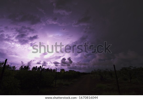 Lightning Tears Through Clouds During Thunderstorm Stock Photo ...