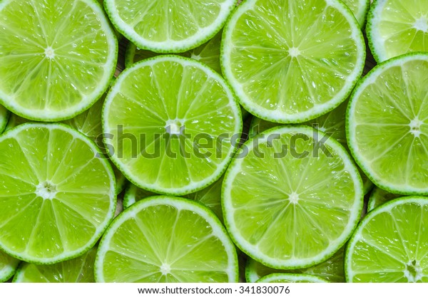 Lime Slices Background Stock Photo (Edit Now) 341830076